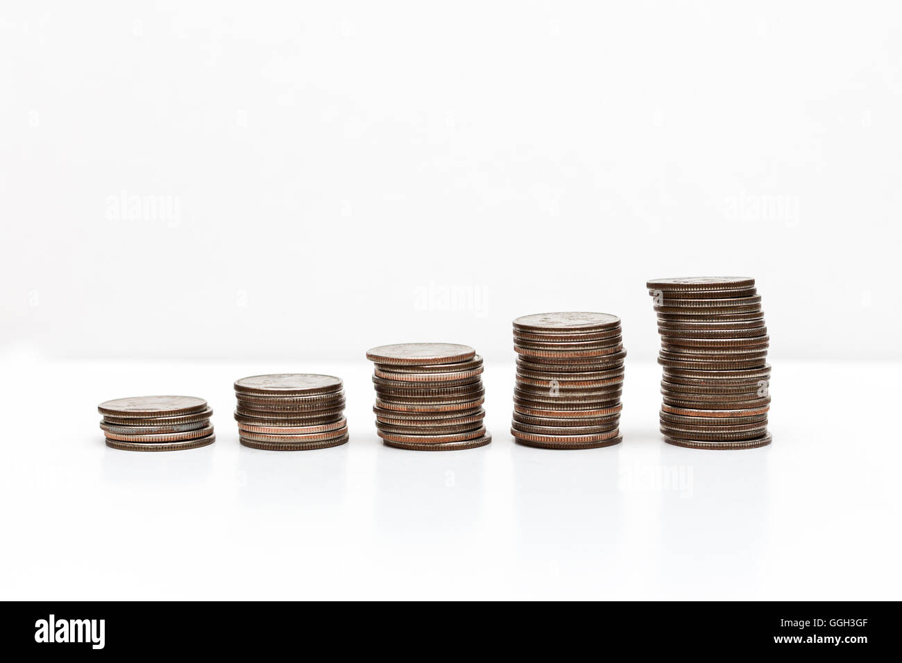 Silver dollar pile hi-res stock photography and images - Alamy