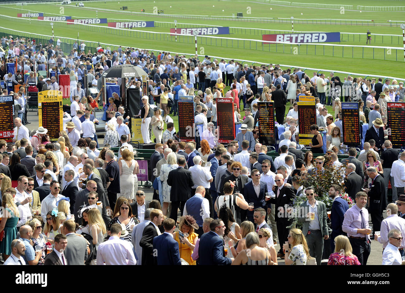 Large crowds gather in the enclosures during Betfred Rose Of Lancaster ...