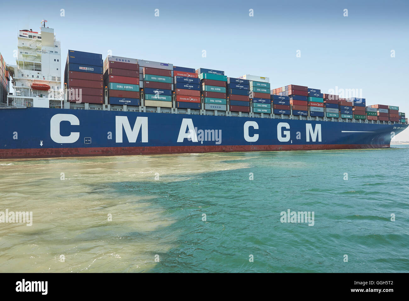 The Giant CMA CGM Centaurus New Panamax Container Ship Is Manoeuvred ... The Giant CMA CGM Centaurus New Panamax Container Ship Is Manoeuvred ...