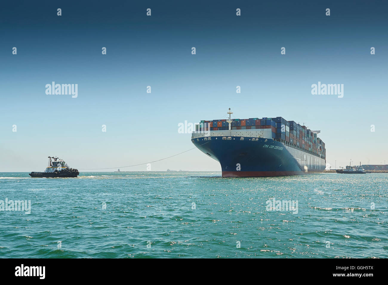 The Giant CMA CGM Centaurus New Panamax Container Ship Is Manoeuvred ... The Giant CMA CGM Centaurus New Panamax Container Ship Is Manoeuvred ...