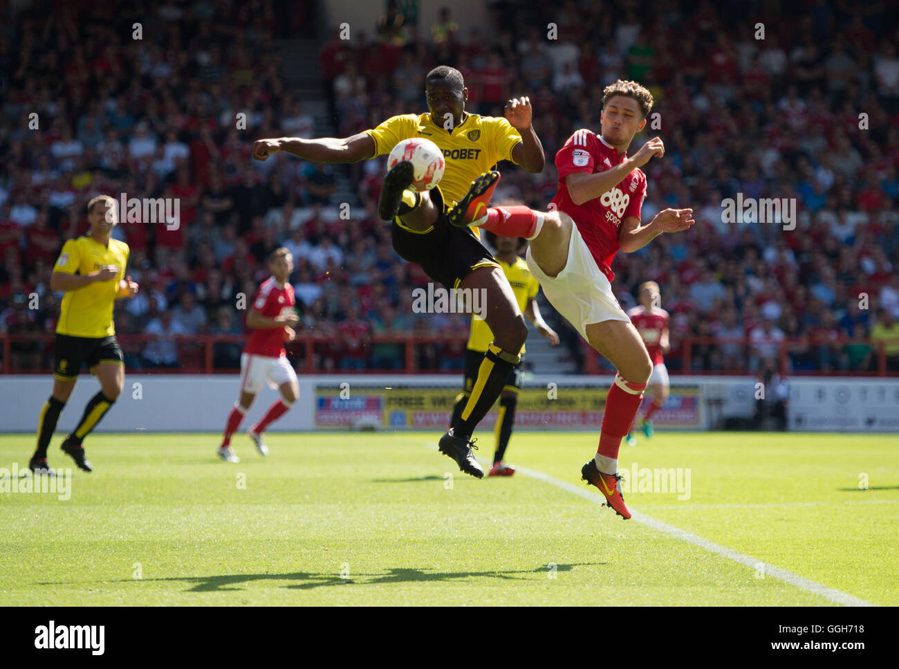 Nottingham ForestÂ’s Matty Cash (right) challenges Burton AlbionÂ’s ...