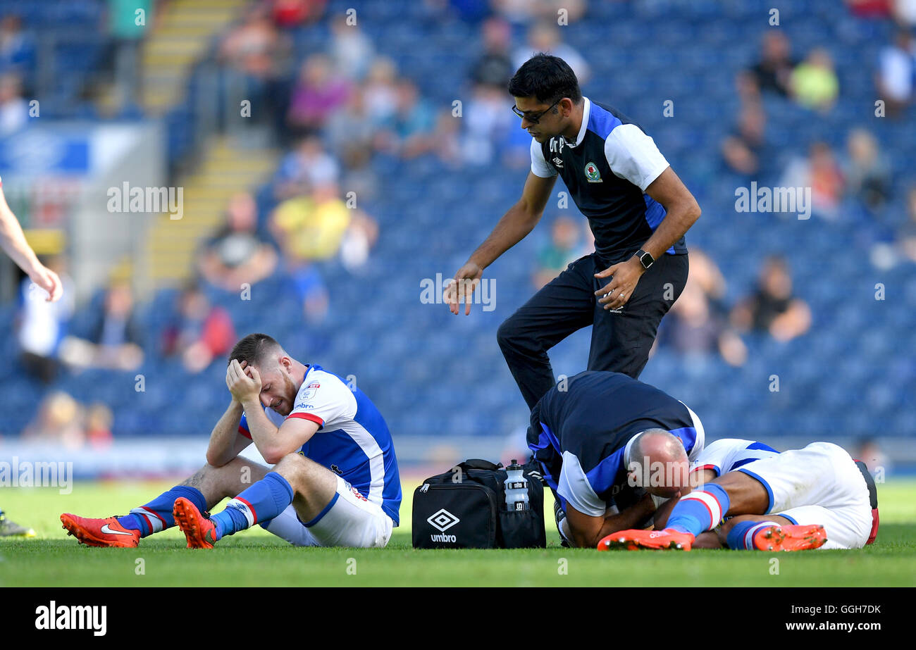 Blackburn Rovers' Adam Henley receives treatment for a head injury ...