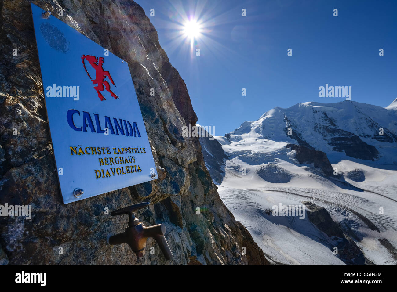 Calanda beer tap in the via ferrata at Piz Trovat with view to Piz ...