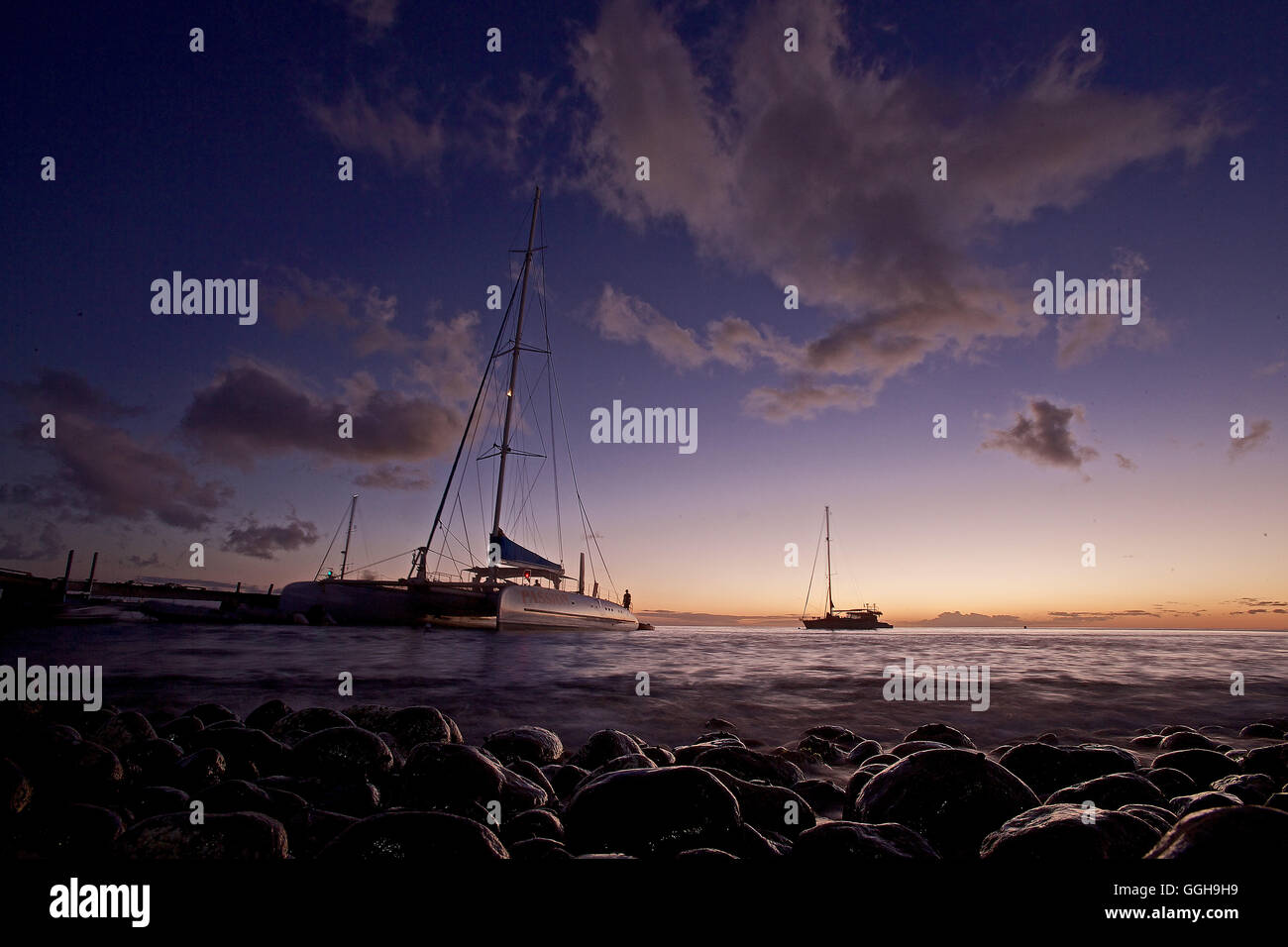 Sailboats in sunset, Dominica, Lesser Antilles, Caribbean Stock Photo ...