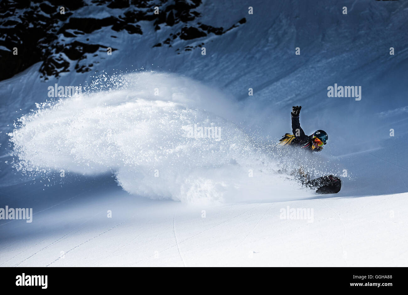 Female snowboarder in mountains hi-res stock photography and images - Alamy