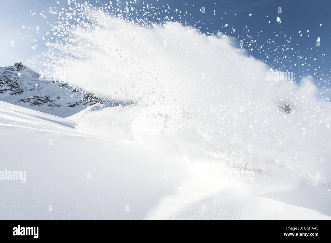 Winter sports athlete doing a turn in the deep powder snow, Pitztal ...