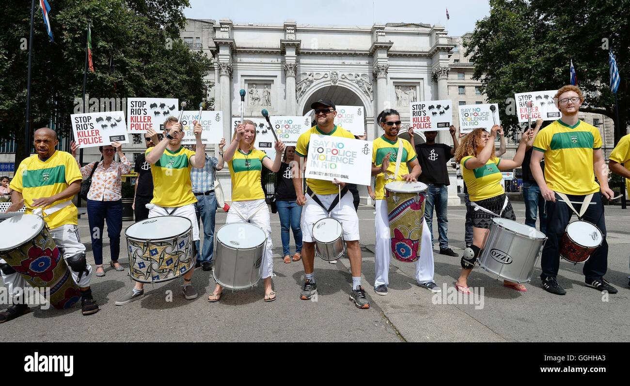 A group of demonstrators from Amnesty International protest declaring ...