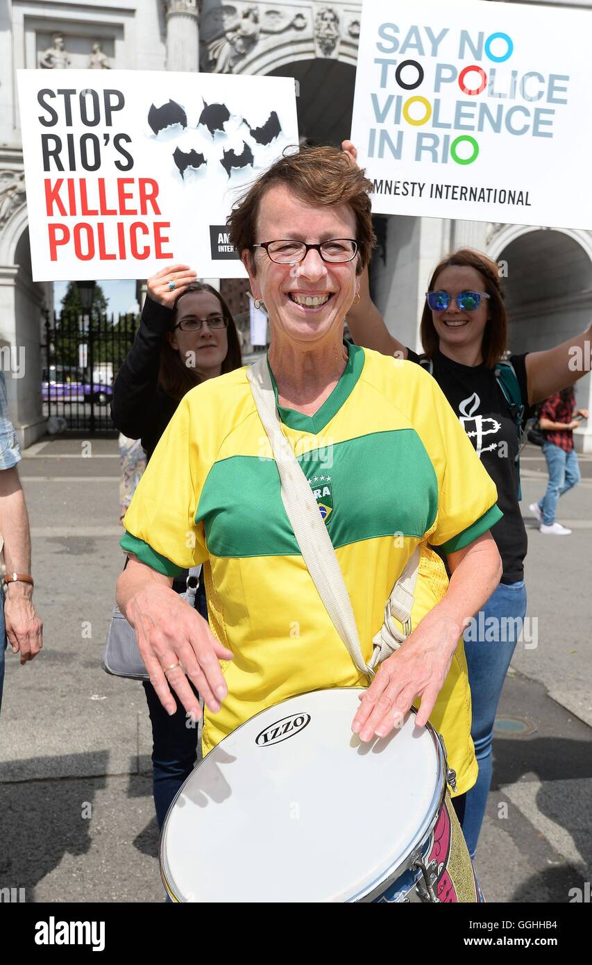 Kate Allen, the UK Director of Amnesty International, joins a group of ...