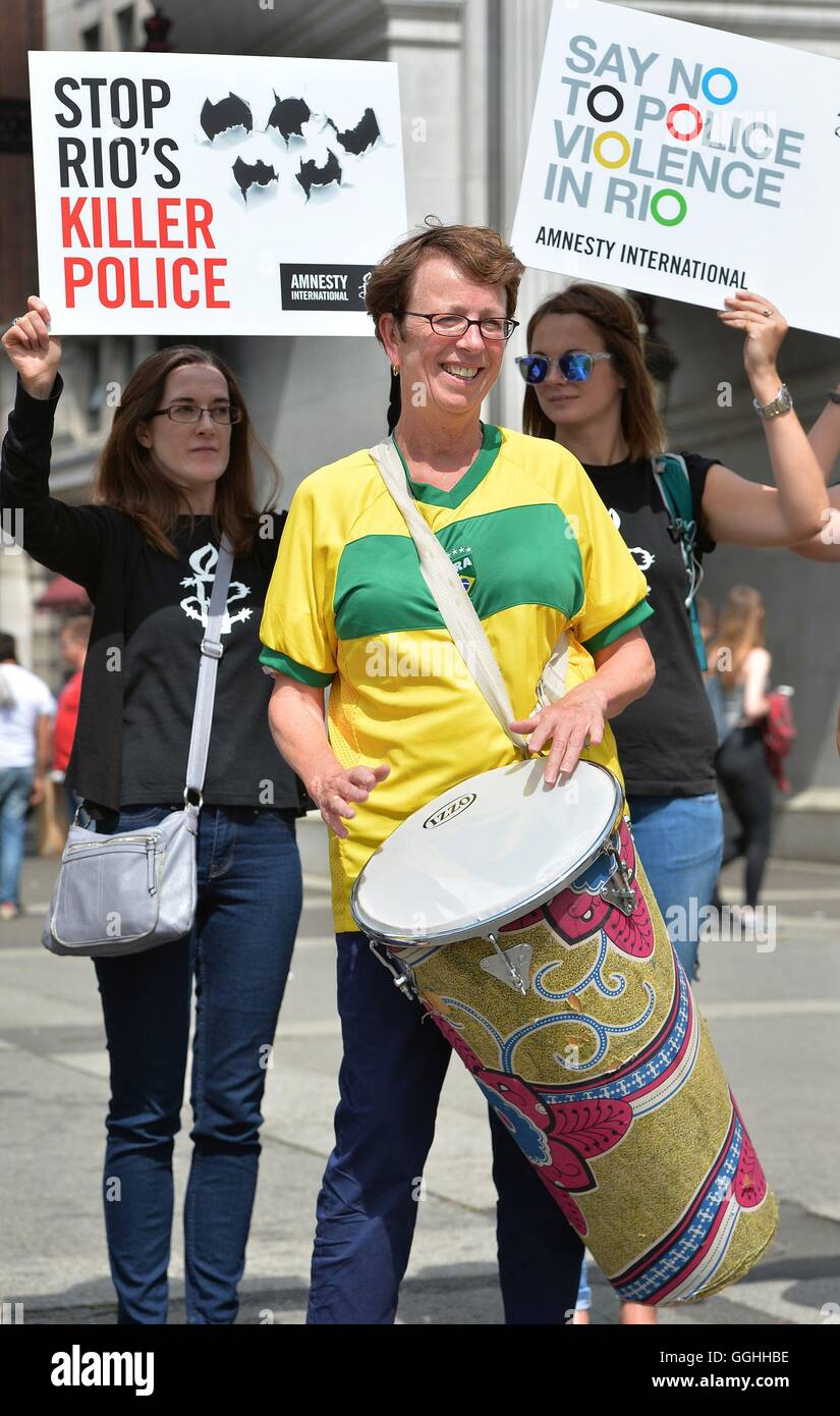 Kate Allen, the UK Director of Amnesty International, joins a group of ...