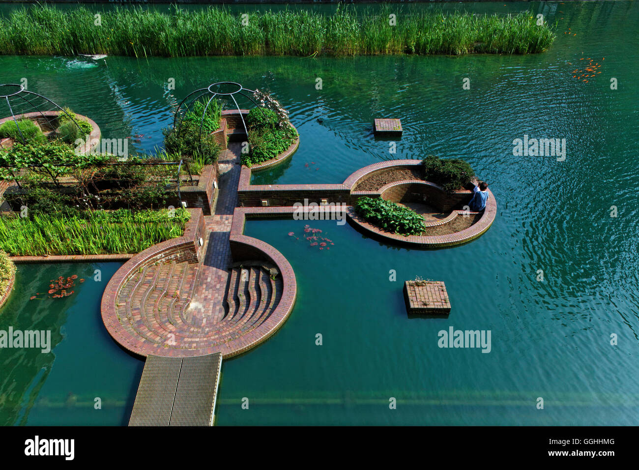 Garden with sitting areas below water level in the Barbican centre ...