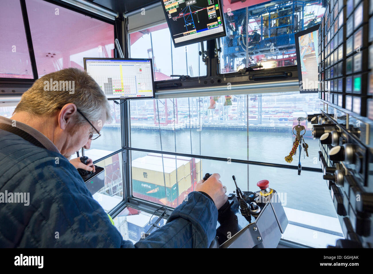 Container gantry crane driver loaded and unloaded a container shipt at ...