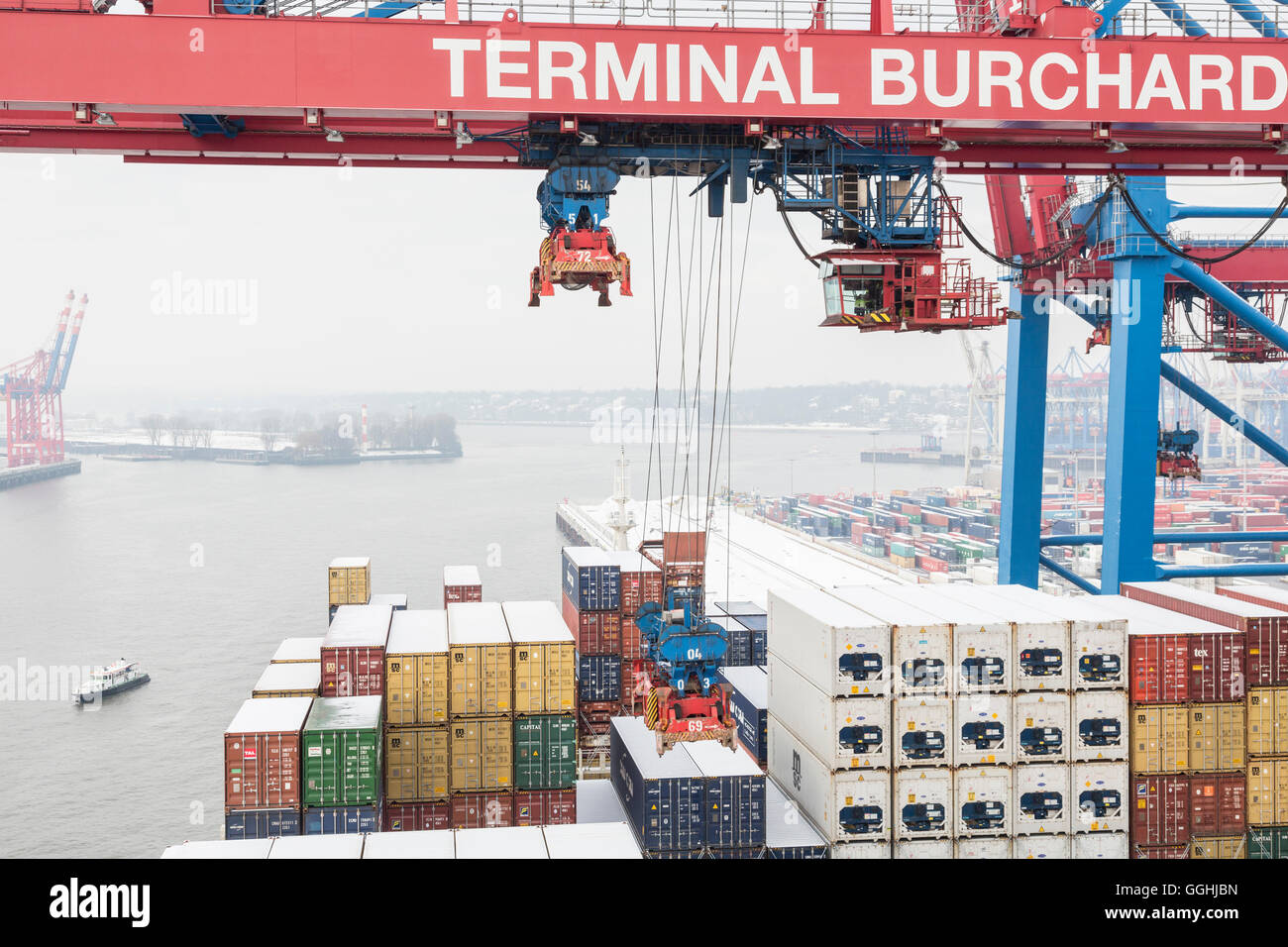 Loading and unloading of the container ship CMA CGM Marco Polo in the ...