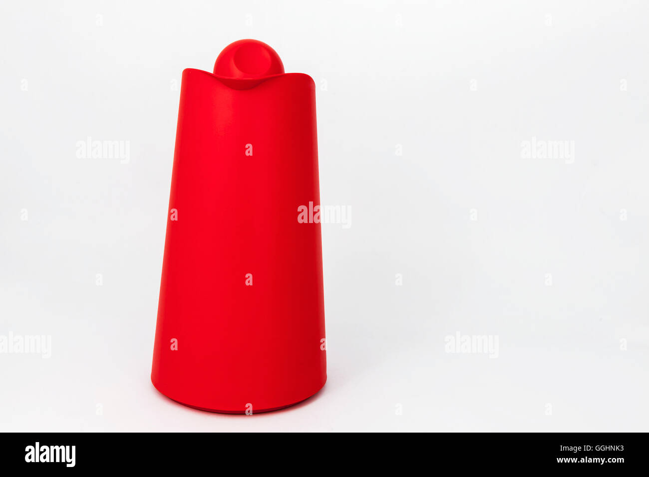 red plastic water jug with white background Stock Photo - Alamy