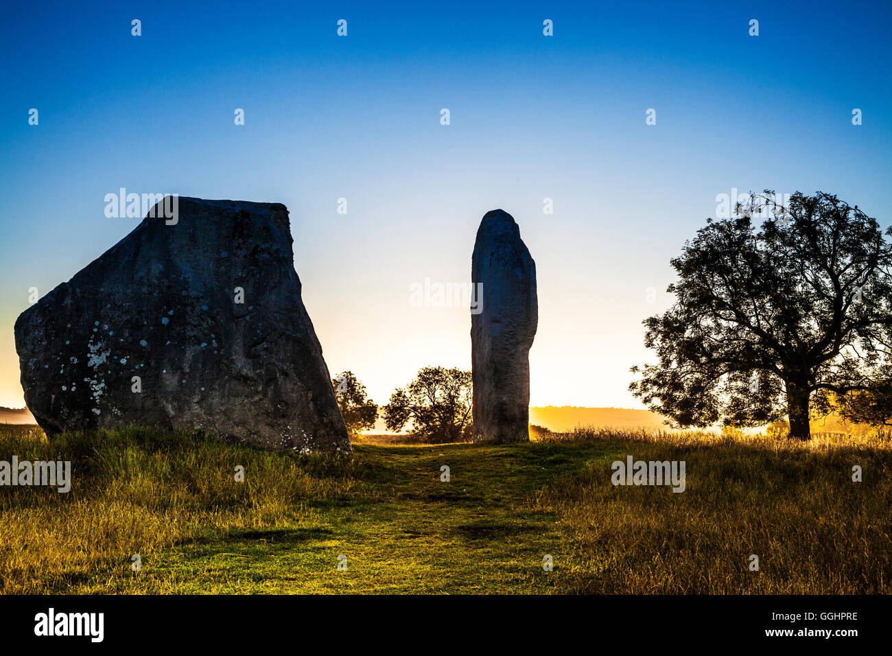 Sarsen stones at sunrise in Avebury, Wiltshire Stock Photo - Alamy