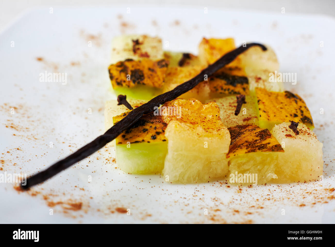 Fresh melon in cubes dredged with cinnamon and spice clove Stock Photo ...