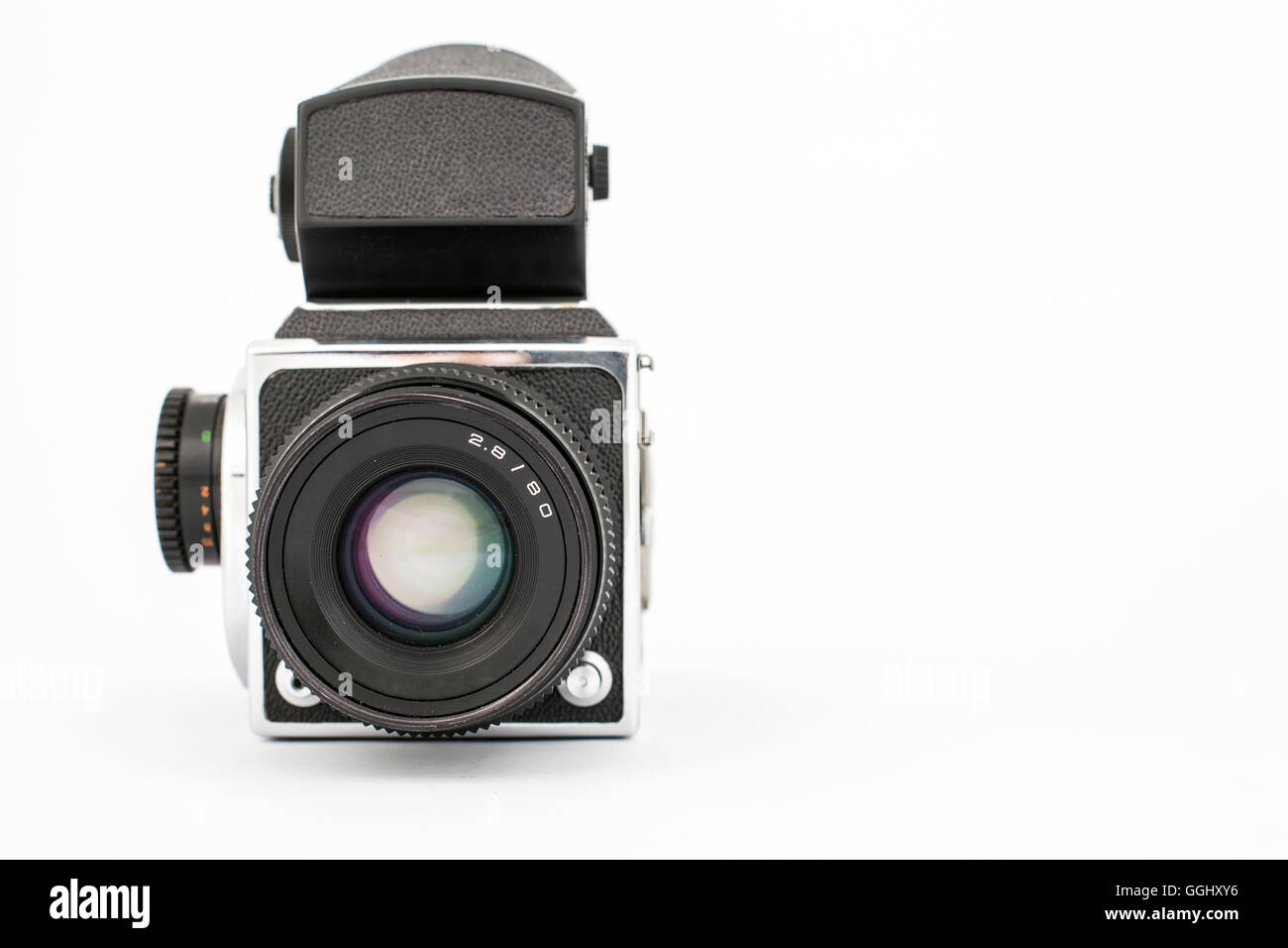 vintage old photographic medium format camera with white background ...