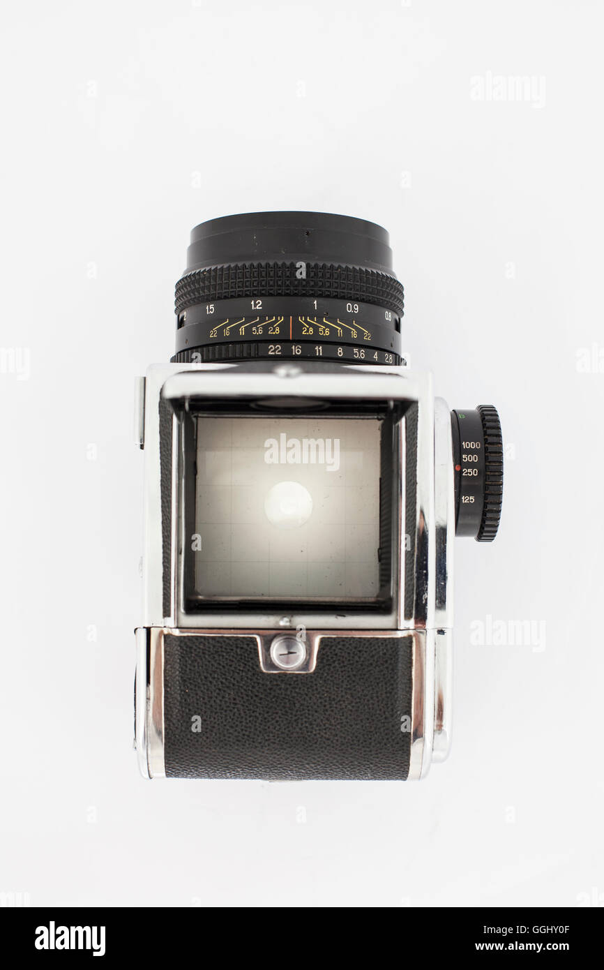 vintage old photographic medium format camera with white background ...