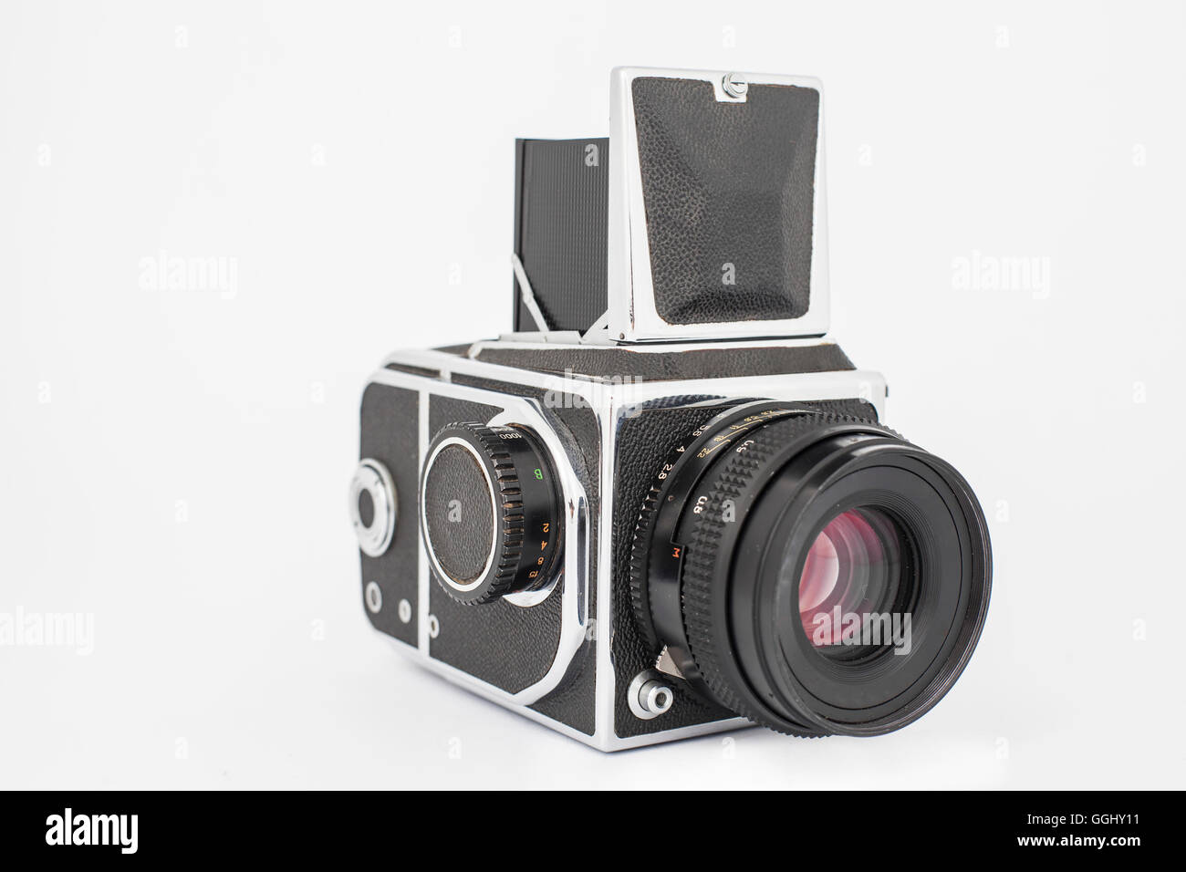 vintage old photographic medium format camera with white background ...