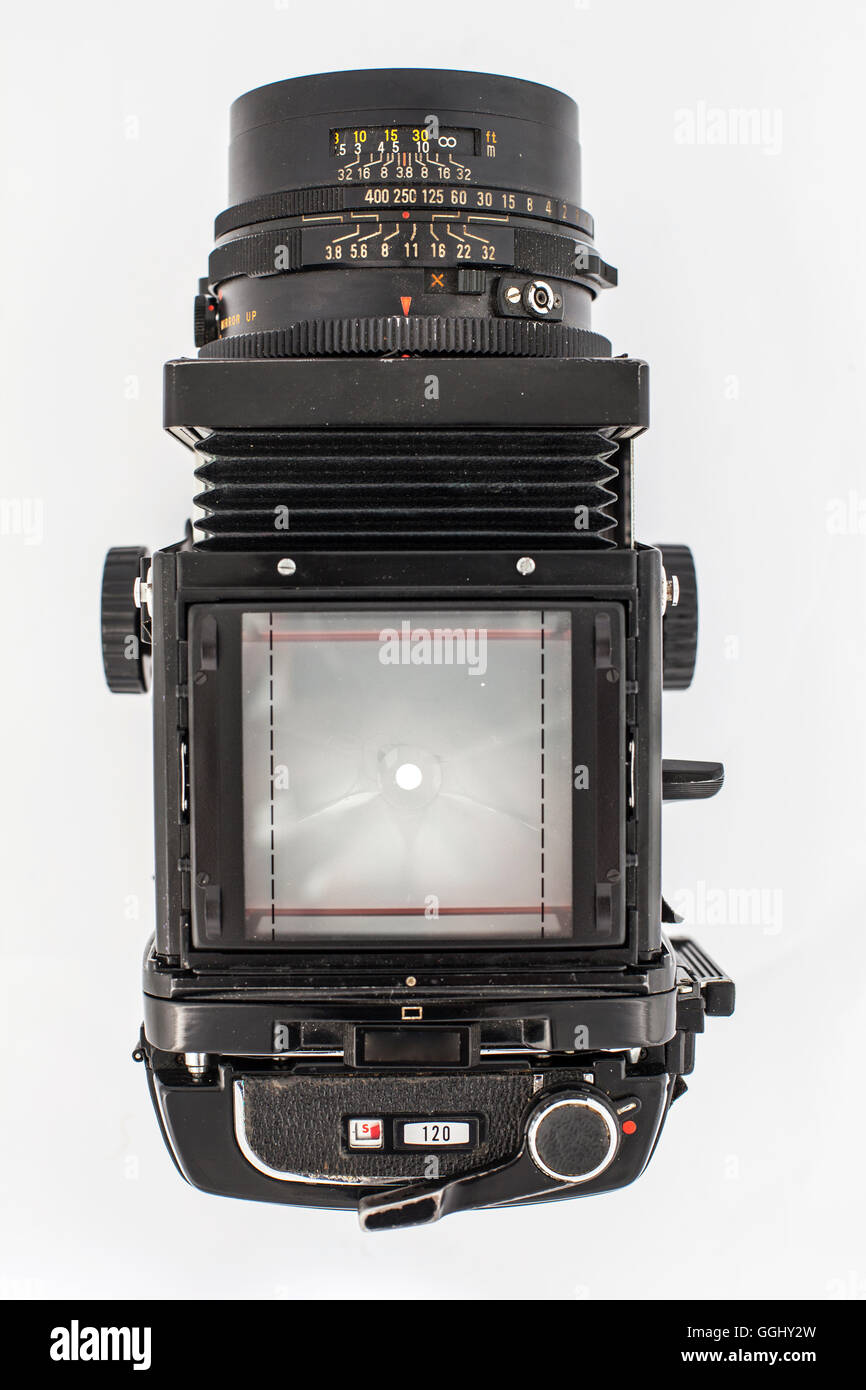 vintage old photographic medium format camera with white background ...