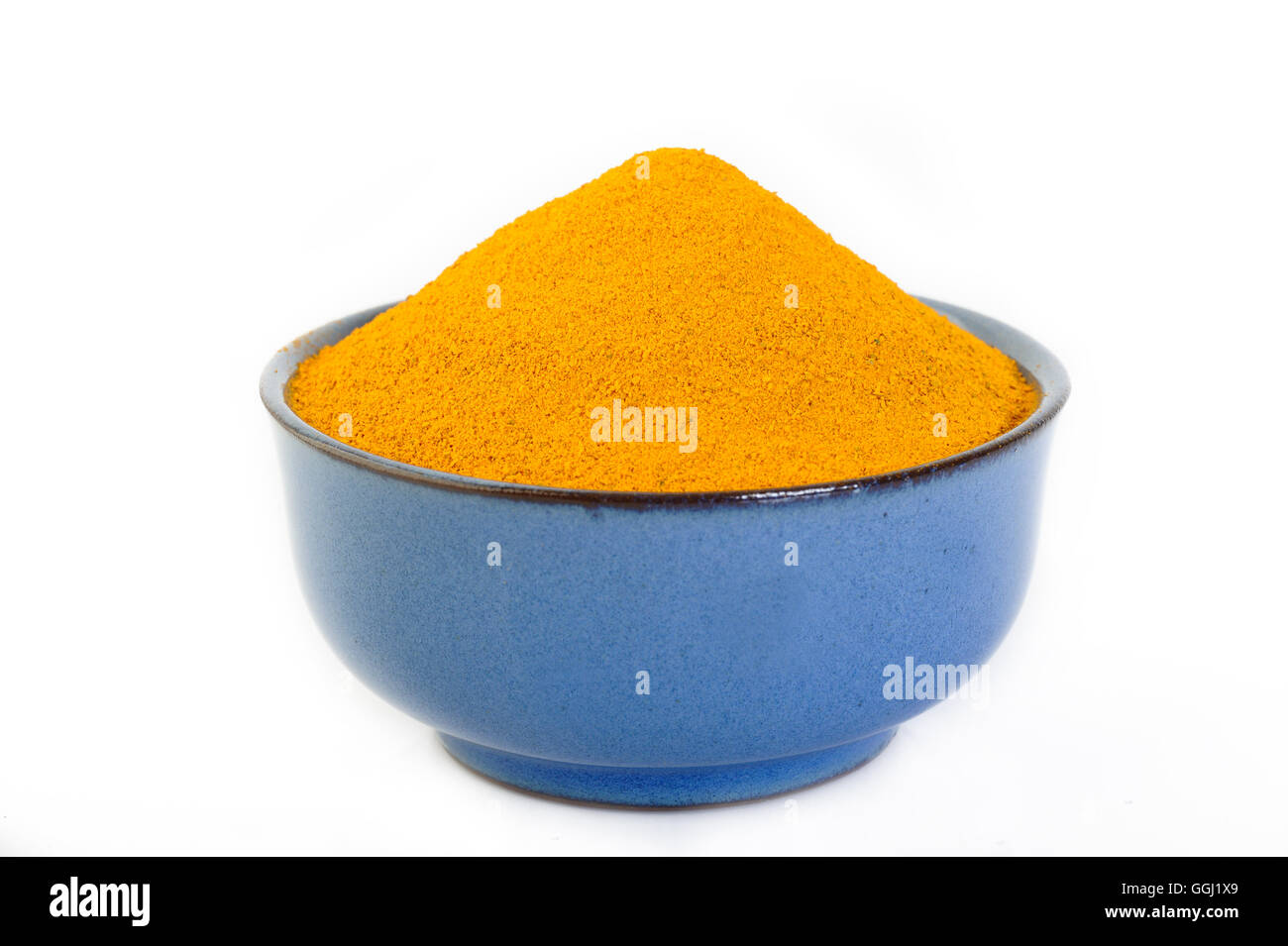 turmeric powder in bowl Stock Photo - Alamy