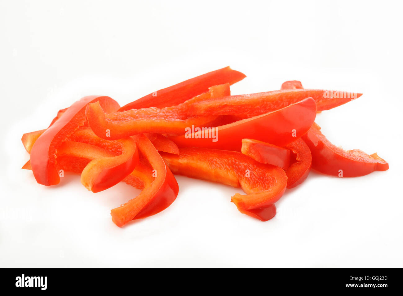 Sliced red pepper isolated on white background Stock Photo - Alamy