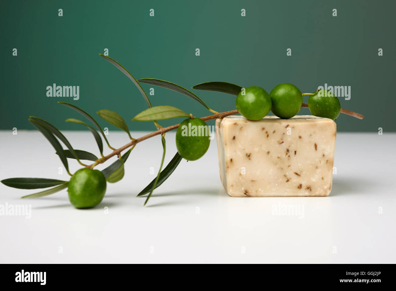 Handmade olive soap with olive branch Stock Photo - Alamy