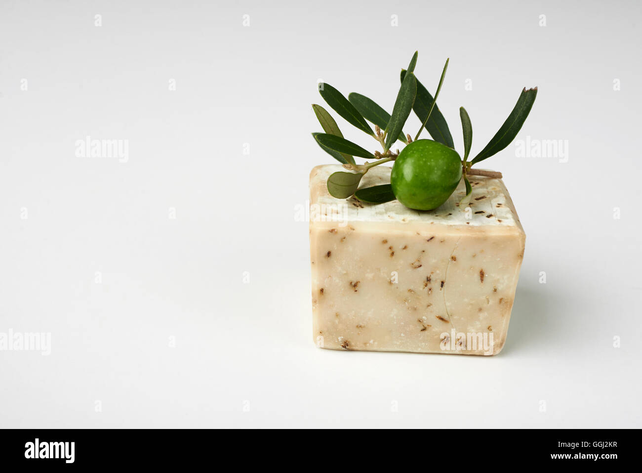 Handmade olive soap with olive branch Stock Photo - Alamy