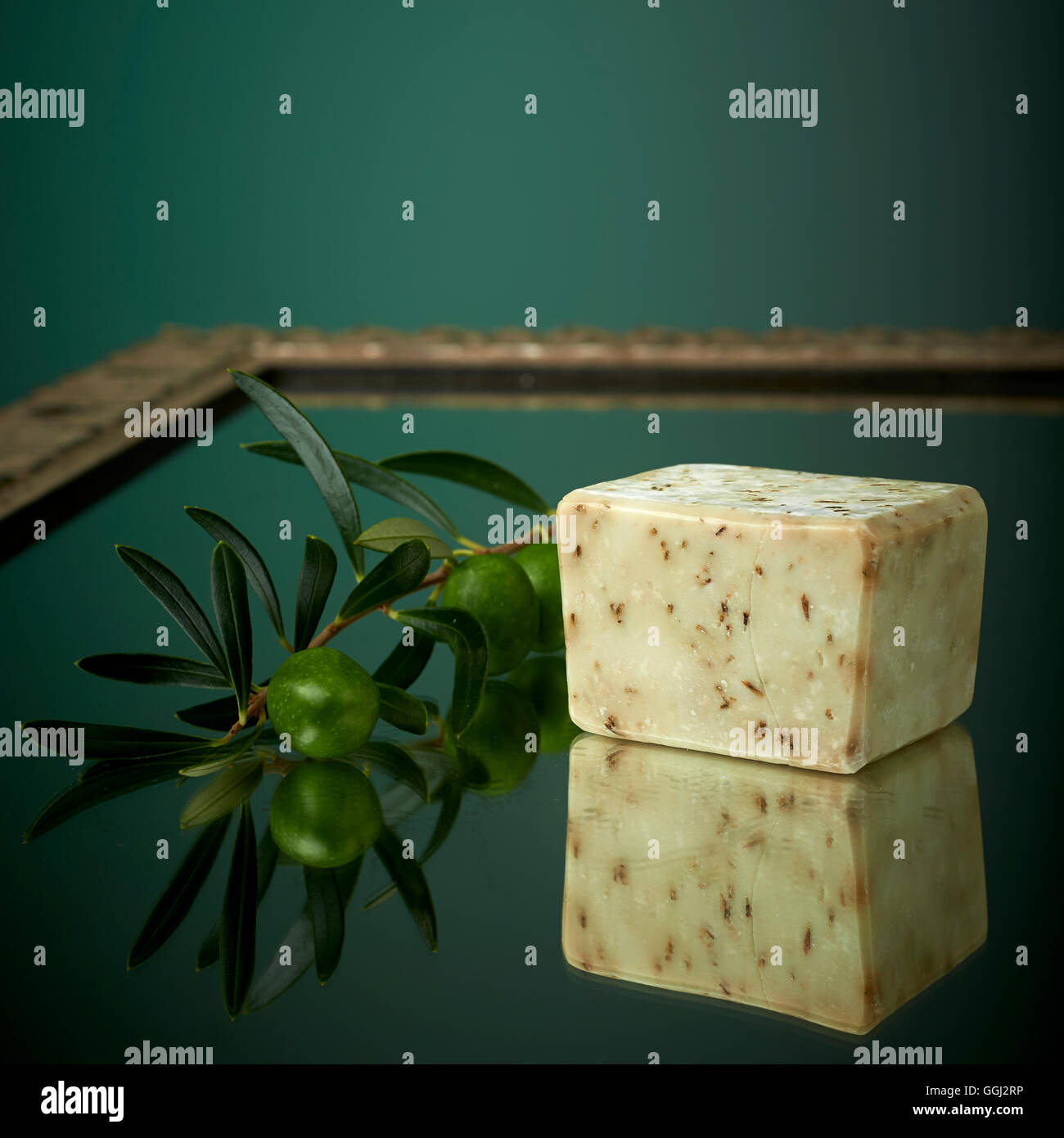Handmade olive soap with olive branch Stock Photo - Alamy