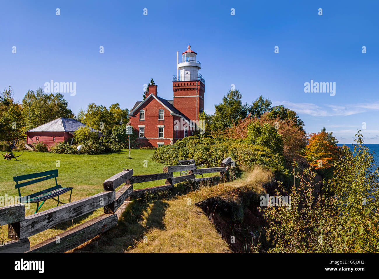 The Big Bay Point Lighthouse on a perfect autumn day at Lake Superior ...
