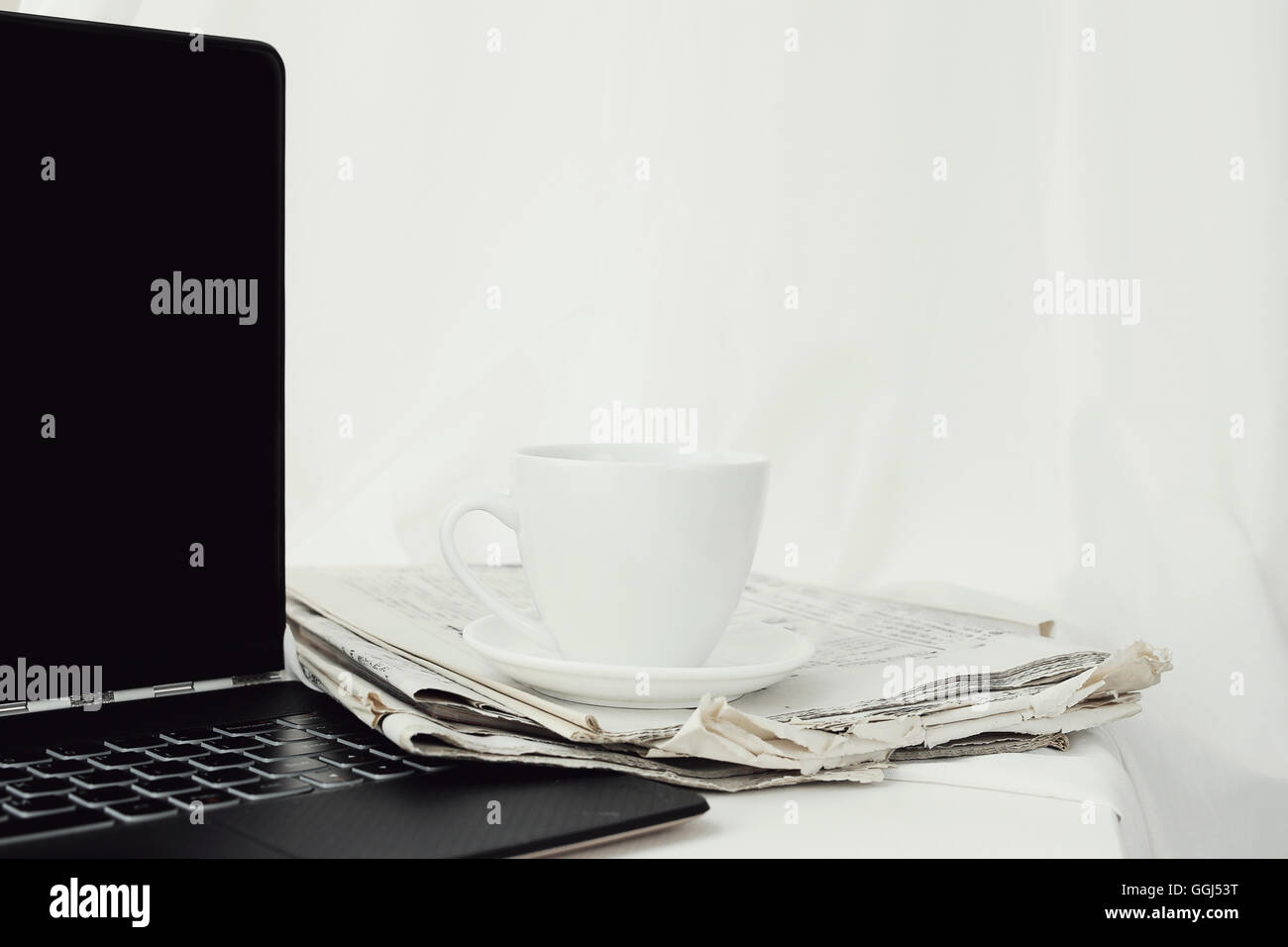 Reading writing laptop newspaper hi-res stock photography and images ...