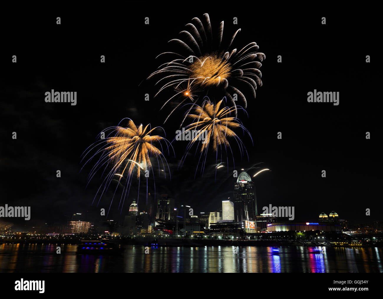 Fireworks bursting over the city of Cincinnati and the Ohio River ...