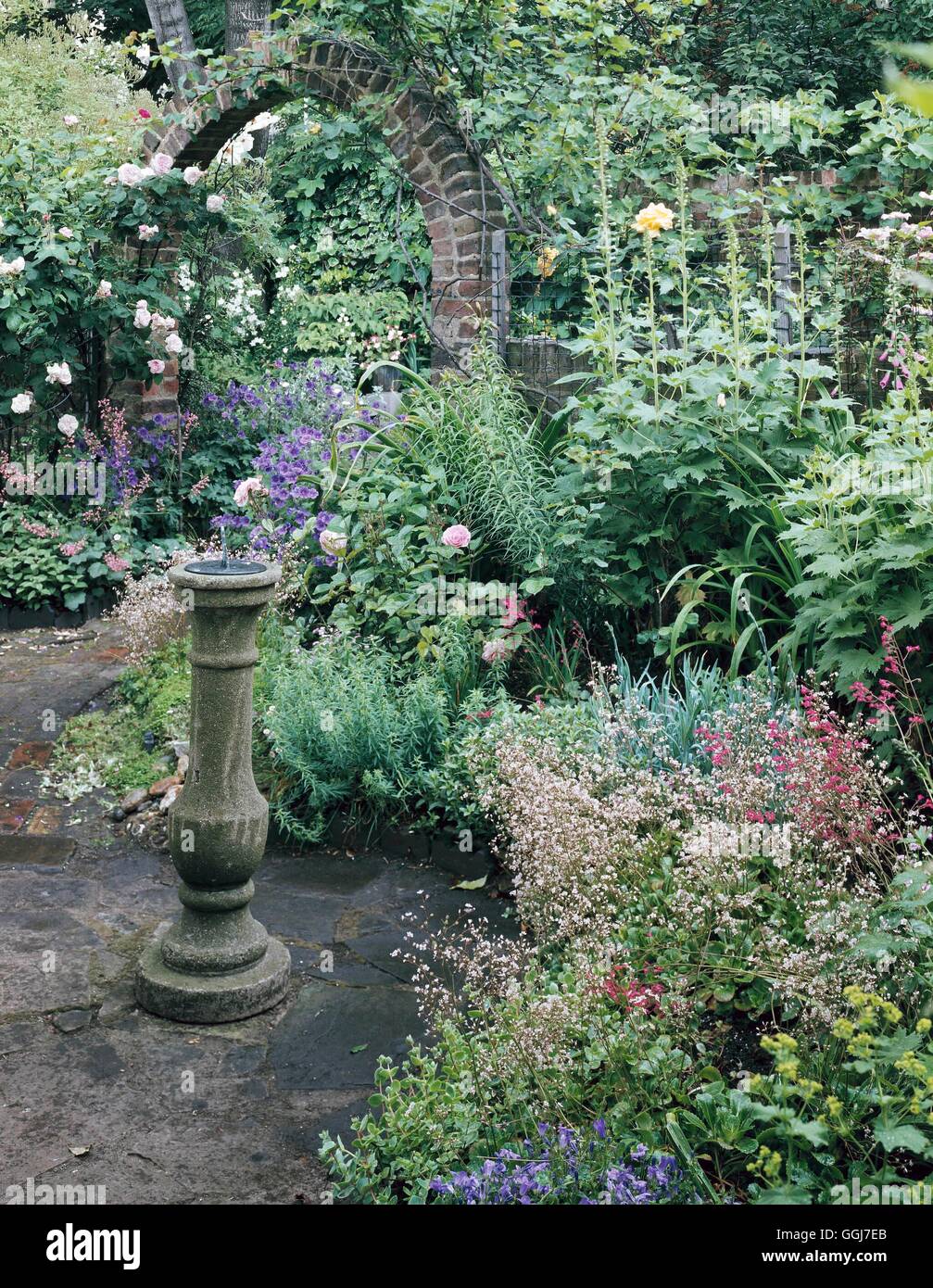 Cottage garden sundial hi-res stock photography and images - Alamy