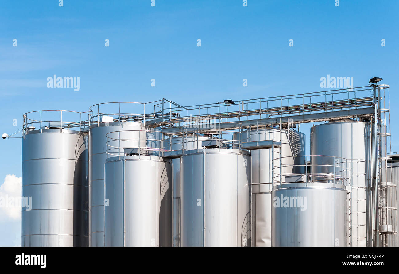 Stainless steel silos . For a milk processing plant Stock Photo - Alamy