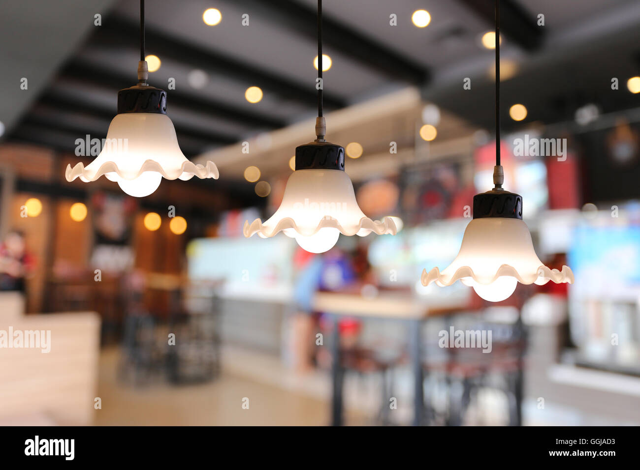 Warm lighting modern ceiling lamps in the cafe and interior decoration ...