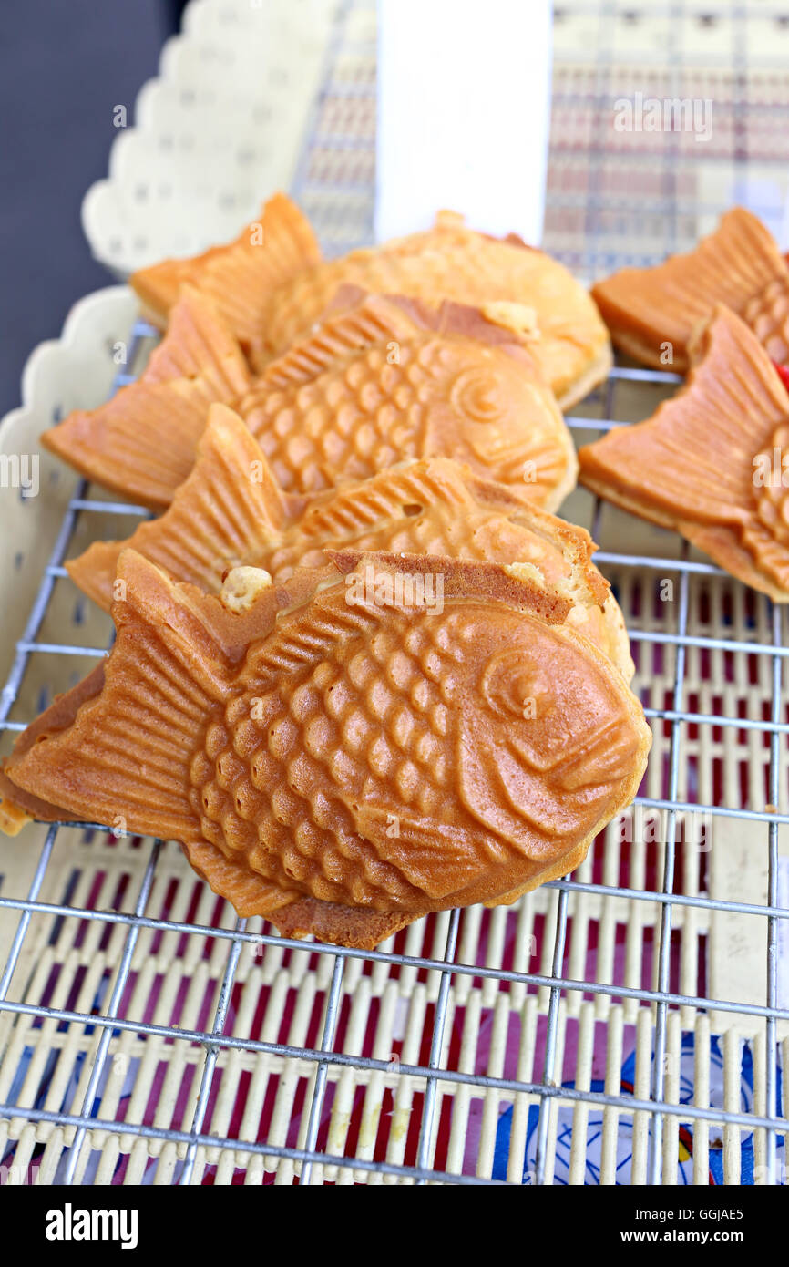 Sweet dessert with shape fish in the market Stock Photo - Alamy
