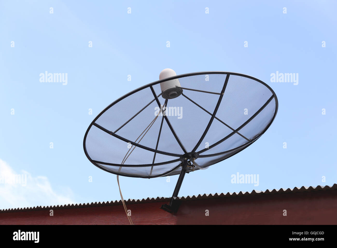 satellite dish on the house roof in bright day Stock Photo - Alamy
