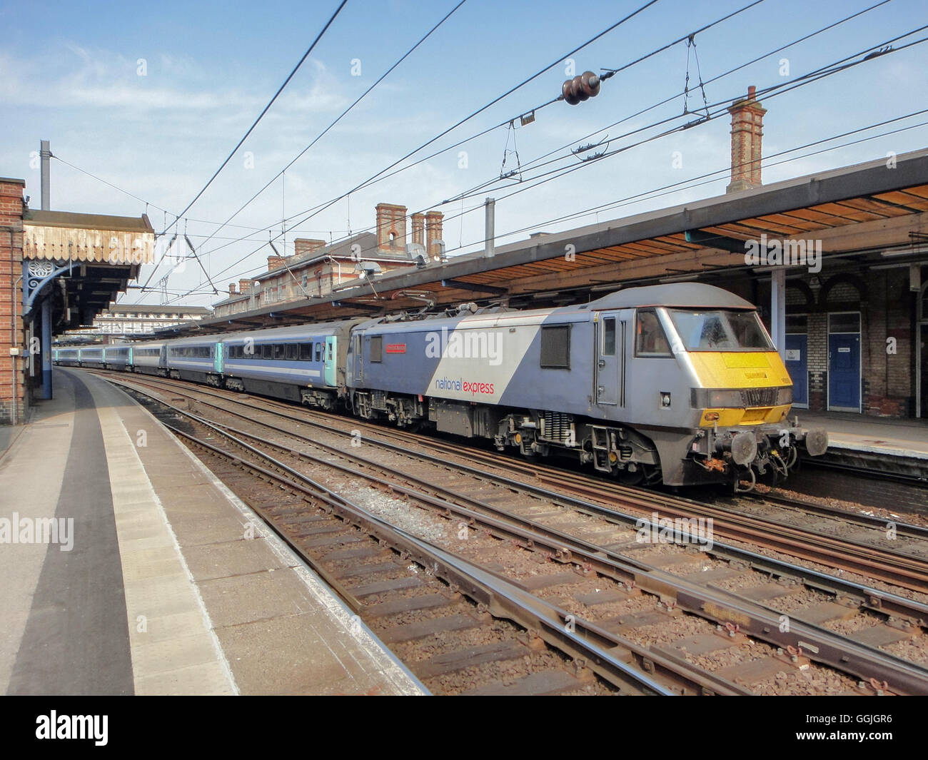 A class 90 locomotive with a rake of Inter-City mark 3 rolling stock at ...