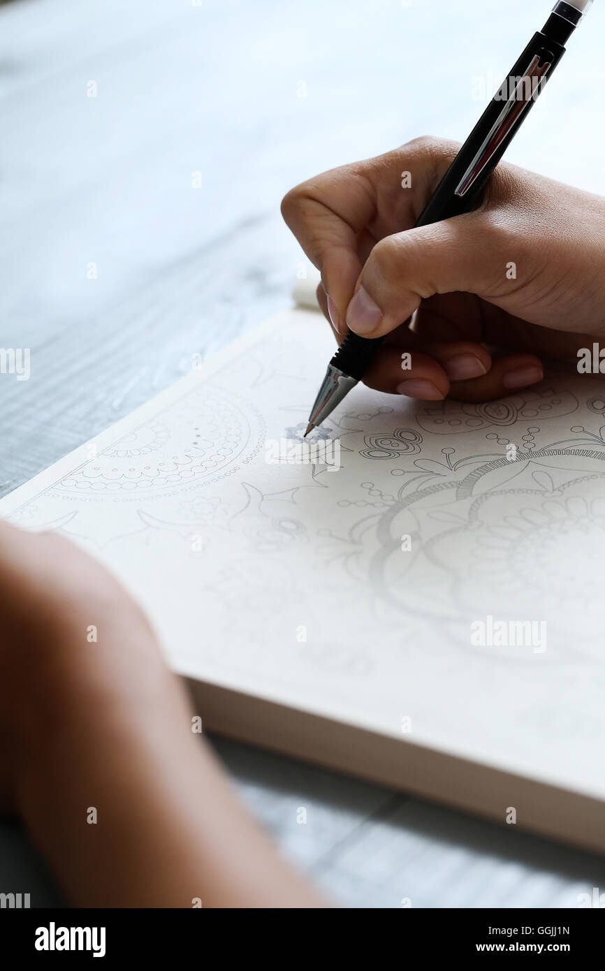 Woman with pen Stock Photo - Alamy