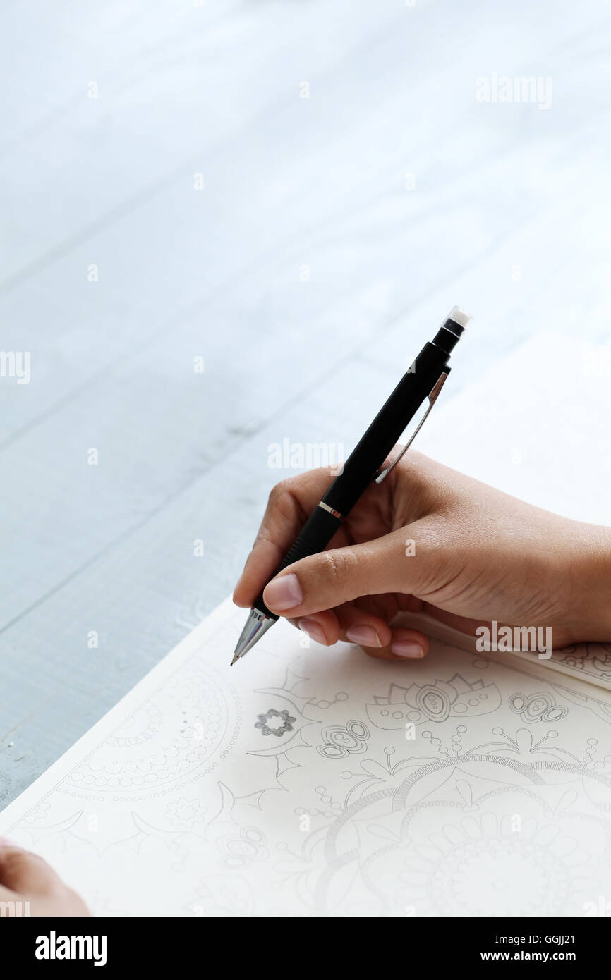 Woman with pen Stock Photo - Alamy