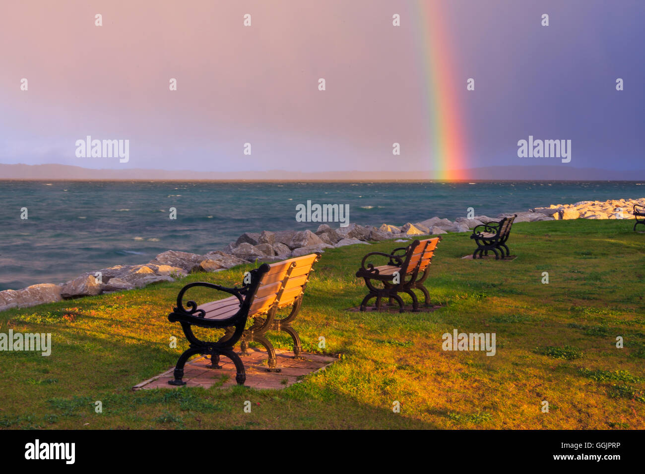 Rainbow colored benches hi-res stock photography and images - Alamy