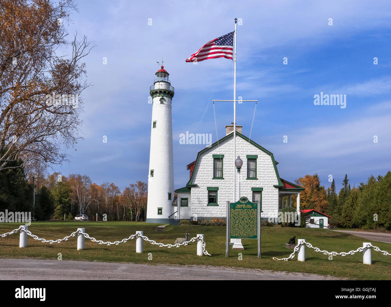 The Presque Isle Lighthouse on Lake Huron during a beautiful autumn ...