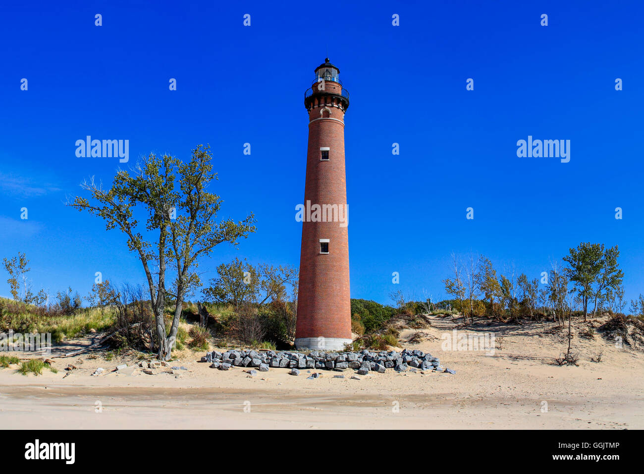 The very tall red brick tower of the Little Sable Point Lighthouse ...