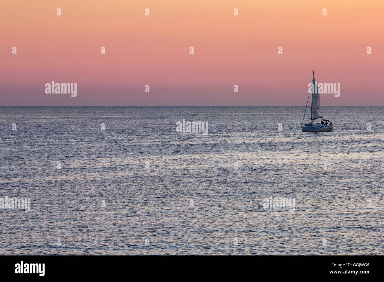 A lonely sailing boat at dawn by Otranto (Lecce, Salento, Puglia, Italy ...