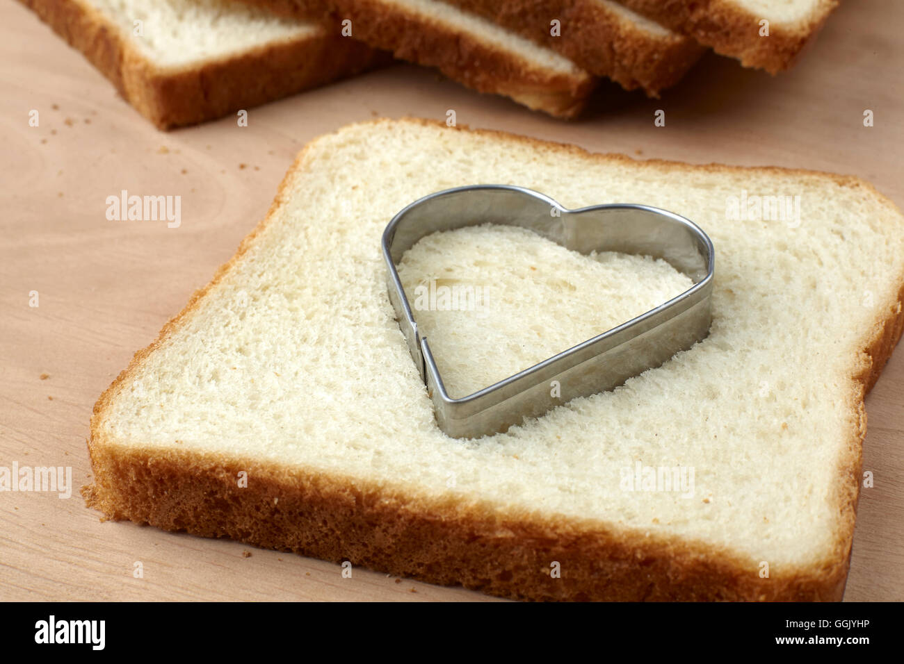 Slice bread cut out heart hi-res stock photography and images - Alamy