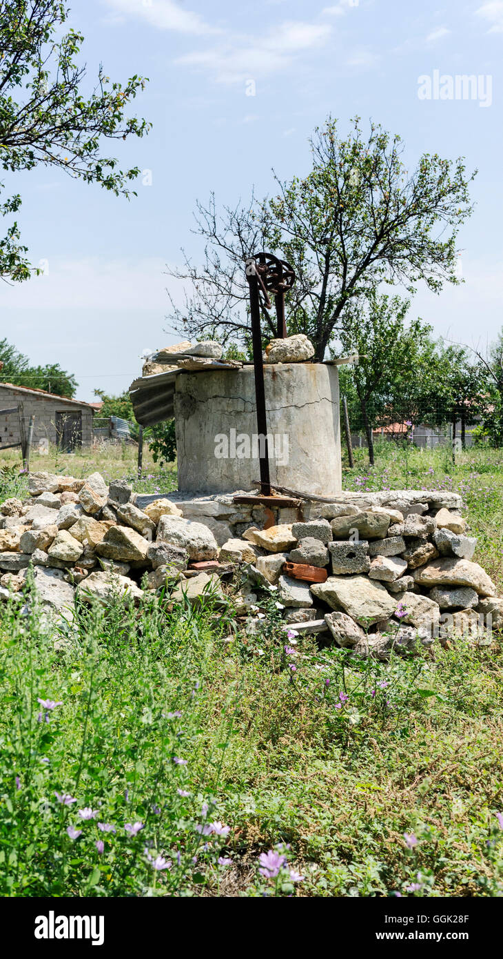 water well made of stones in countryside Stock Photo - Alamy