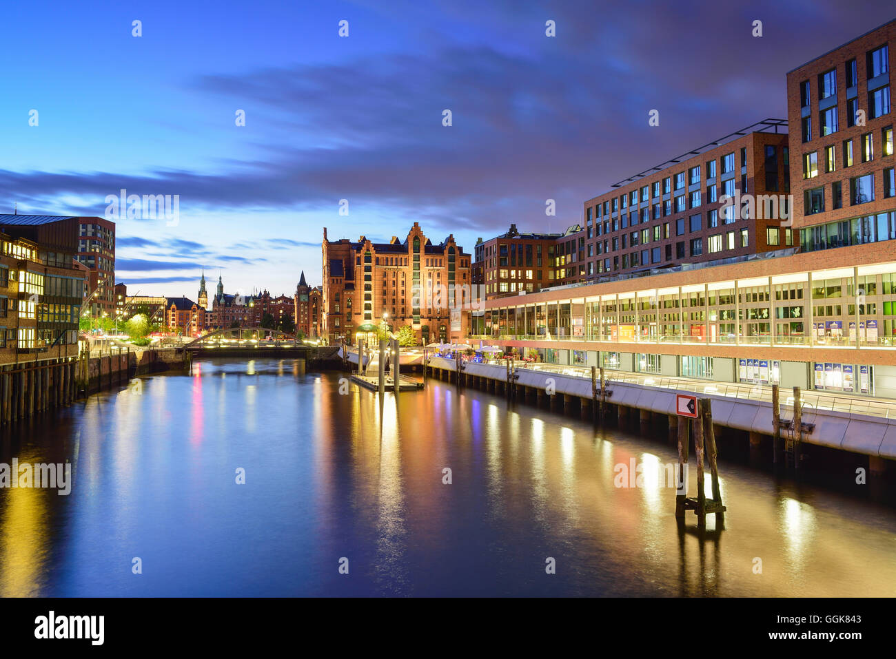 Illuminated port Magdeburger Hafen with warehouse district in the ...