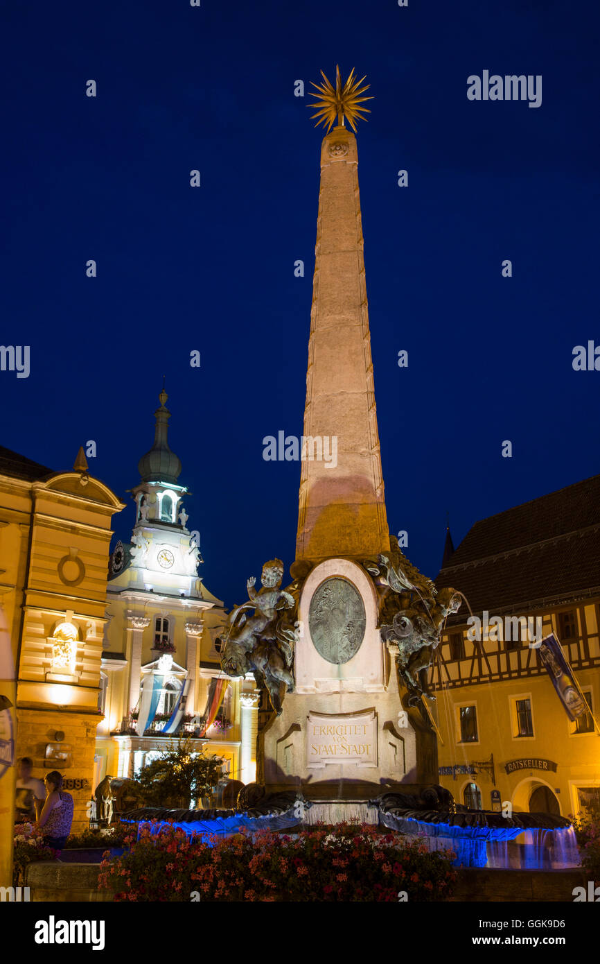 Luitpold fountain and town hall on the market square at night, Kulmbach ...