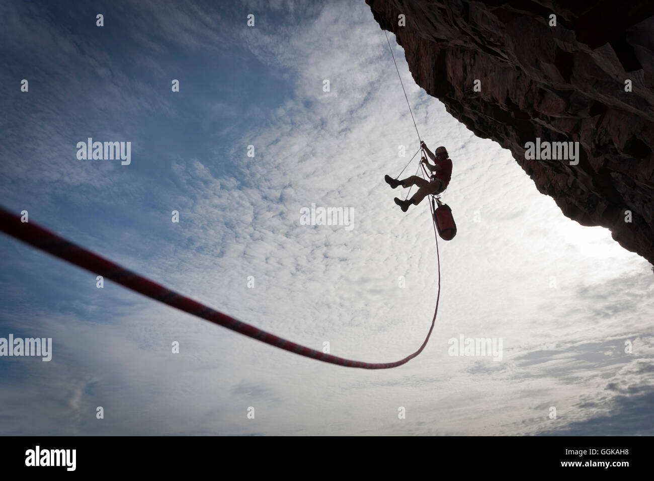 Climber ascending a fixed rope, Acopan Tepui, Macizo de Chimanta ...