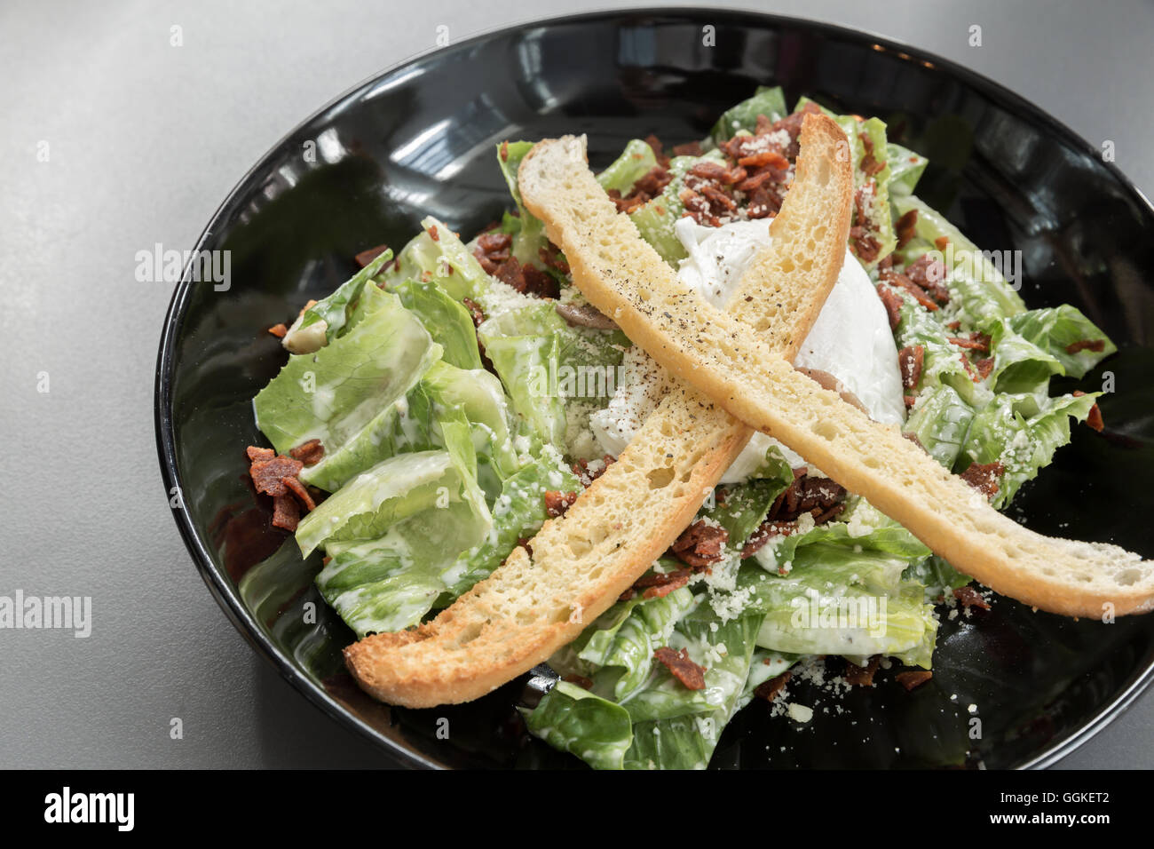 bowl of green caesar salad Stock Photo - Alamy