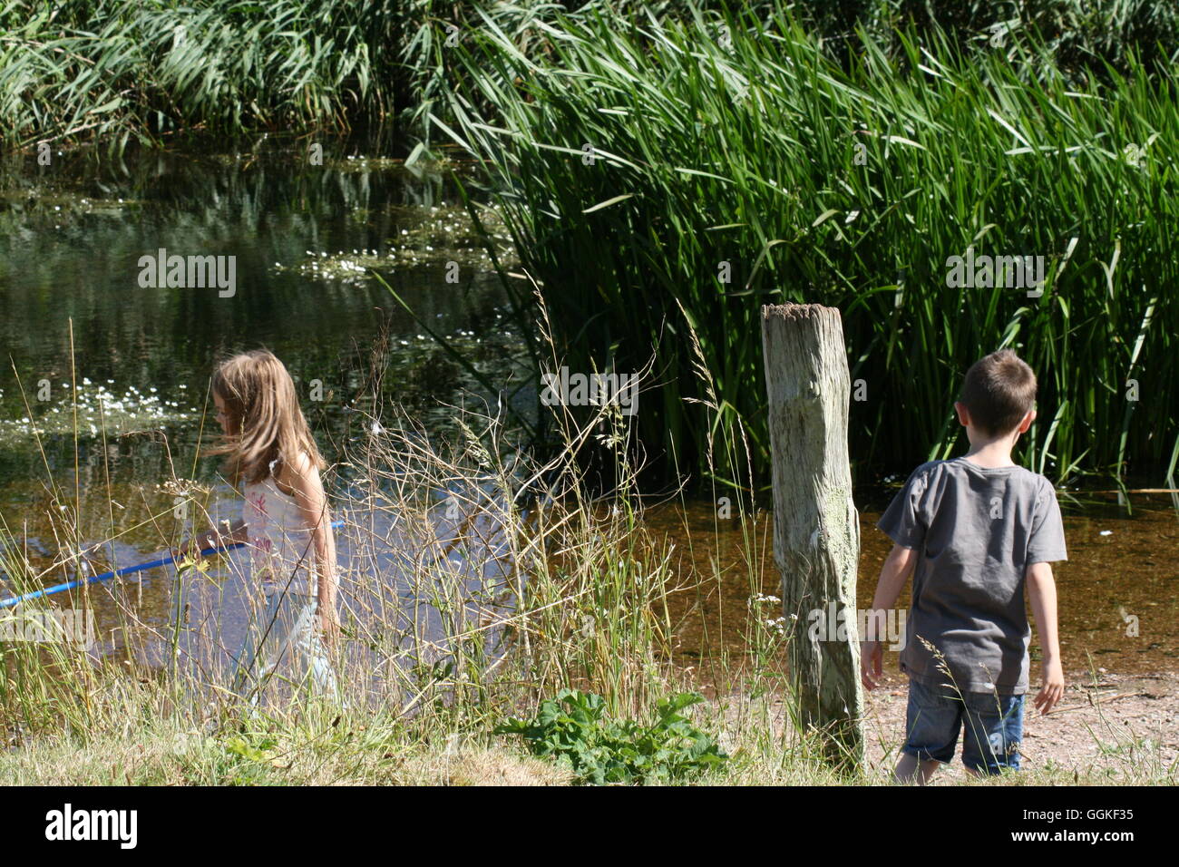 Kids Playing On River Bank High Resolution Stock Photography and Images ...